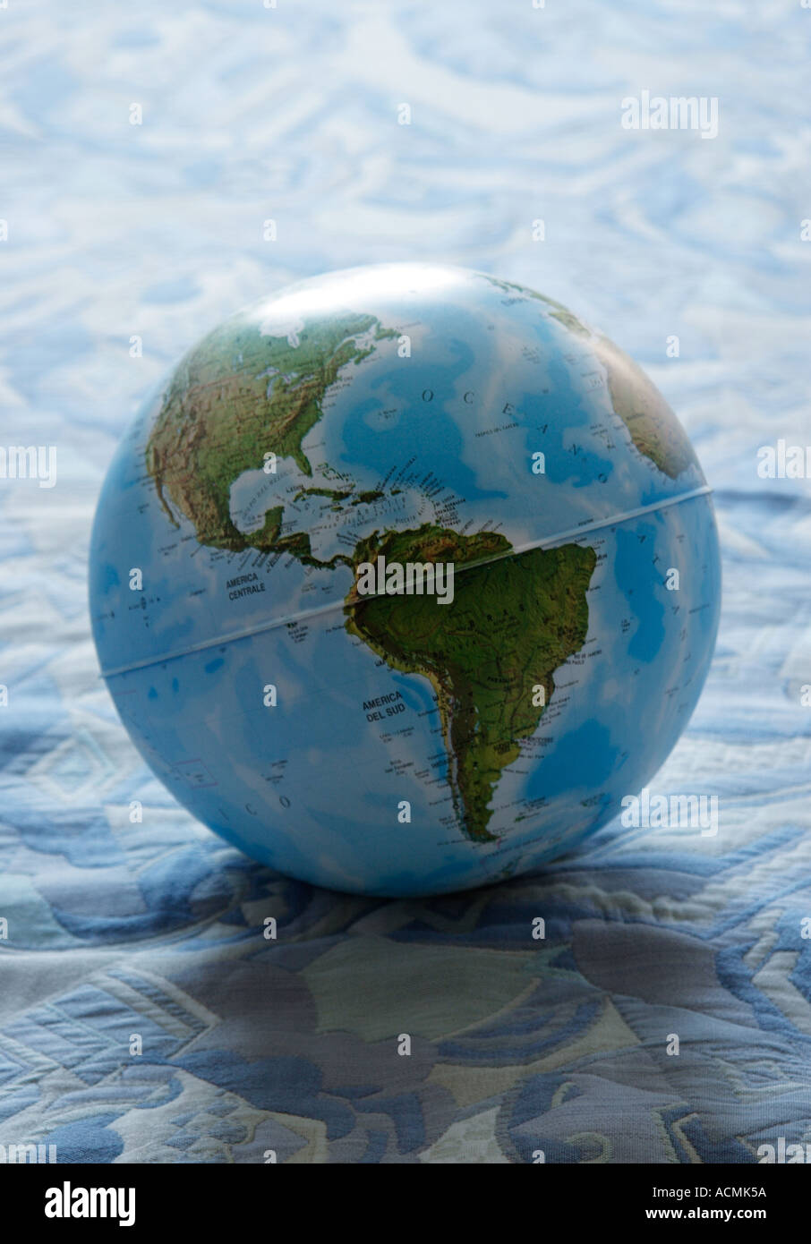 the map of the world ball sphere on the bed Stock Photo - Alamy