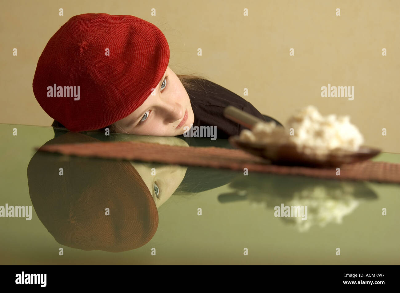 Girl not interested in food Stock Photo - Alamy