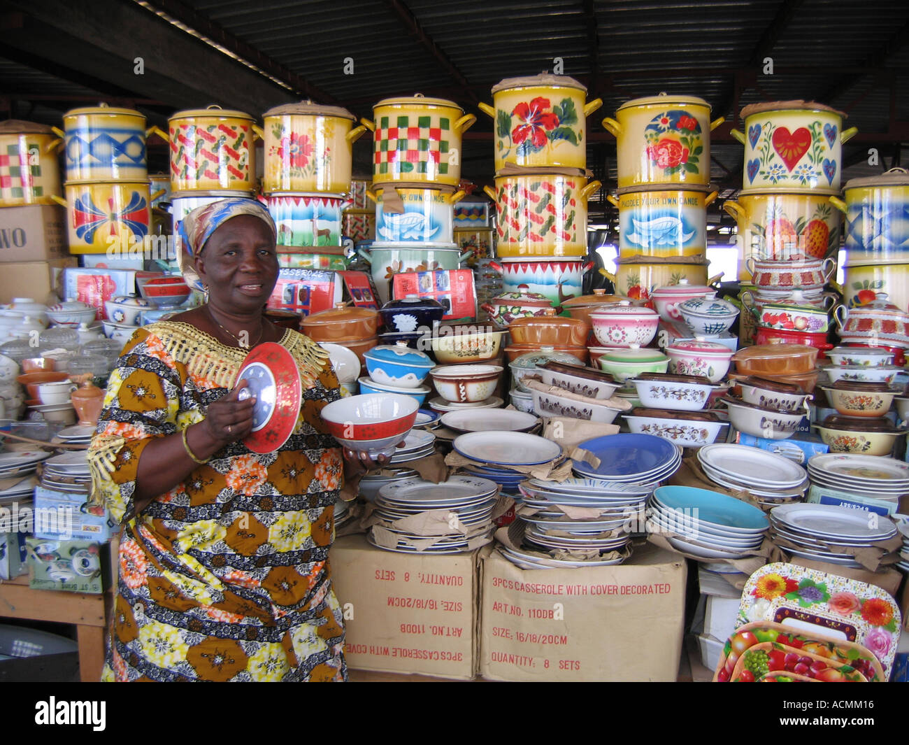 Kitchenware vendor grand market Lome Togo West Africa Stock Photo - Alamy