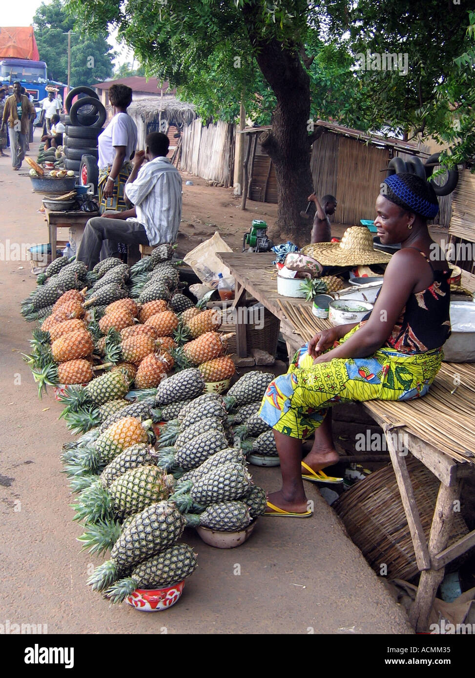 Roadside pineapple vendor Notsé Togo Stock Photo - Alamy