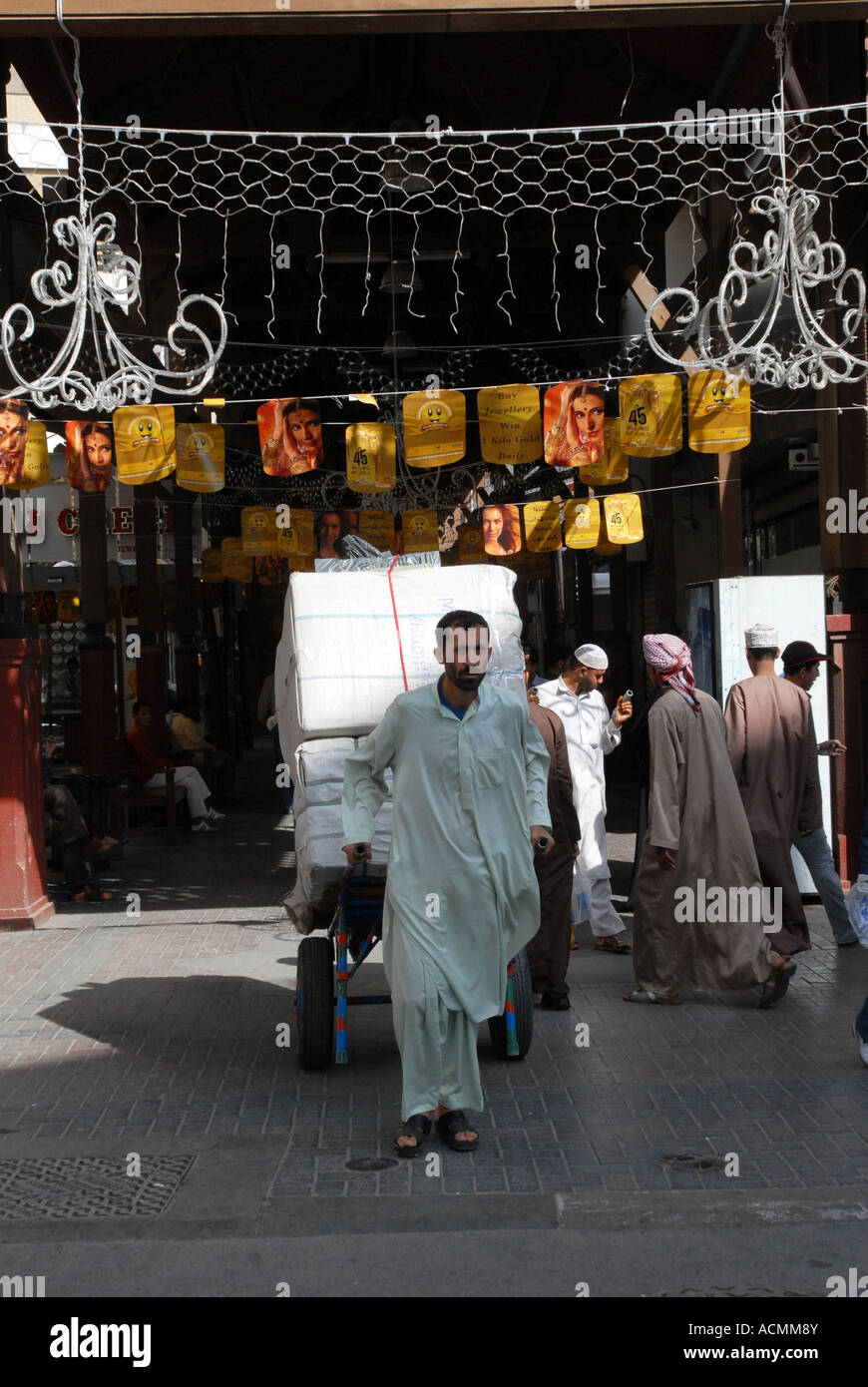 a barrow boy at dubai gold souhk Stock Photo - Alamy
