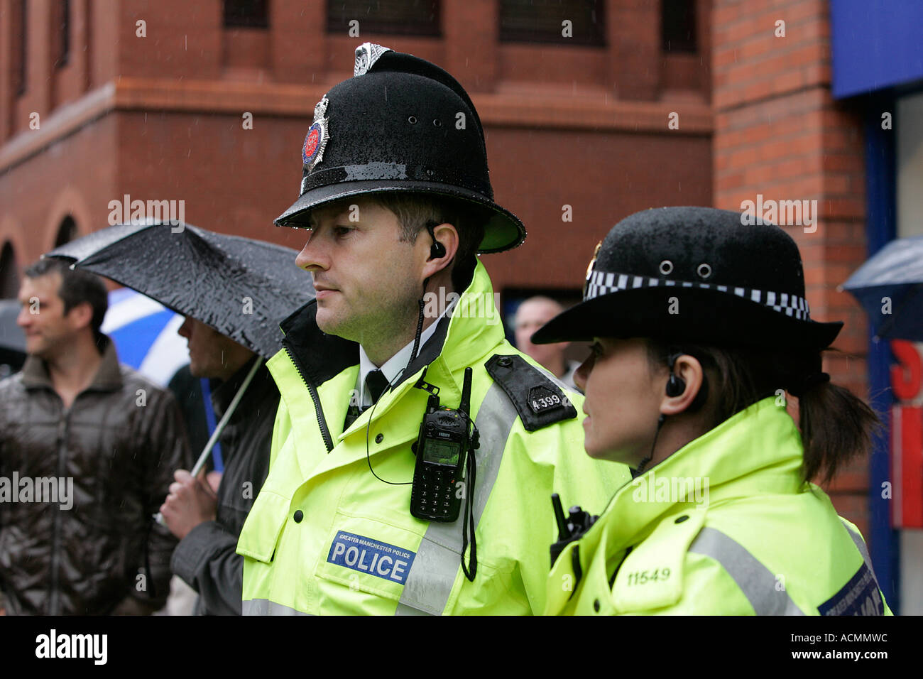 Patrol couple heavy rain security police policemen policeman city urban ...
