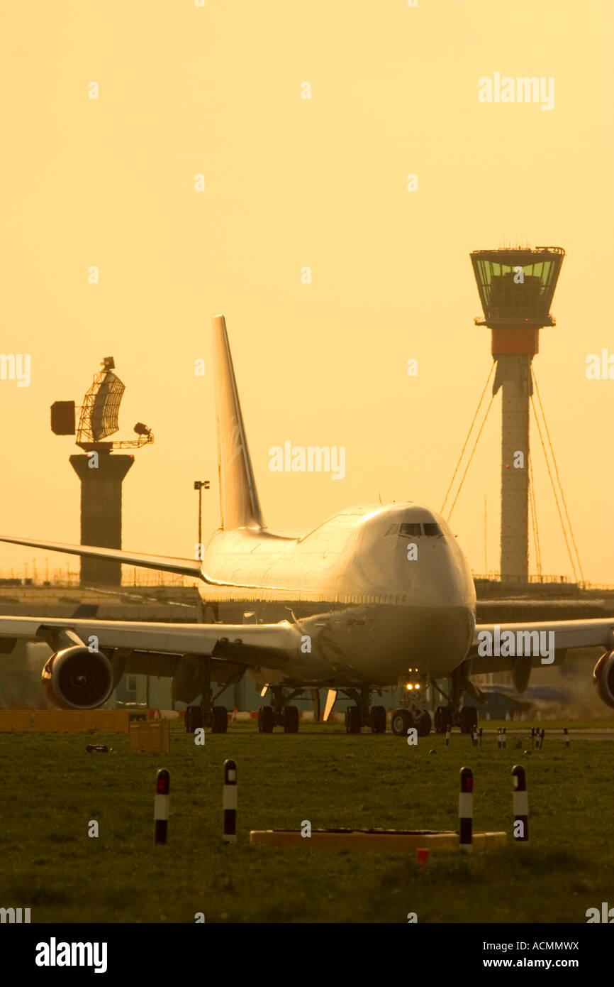 Commercial airliner and new air traffic control tower at London ...