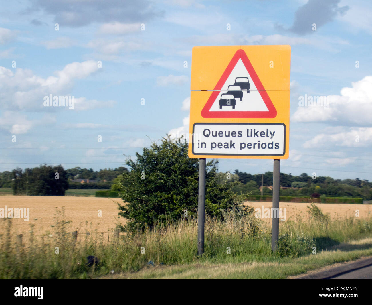 Queues Likely in peak times sign on motorway / A Road Stock Photo - Alamy