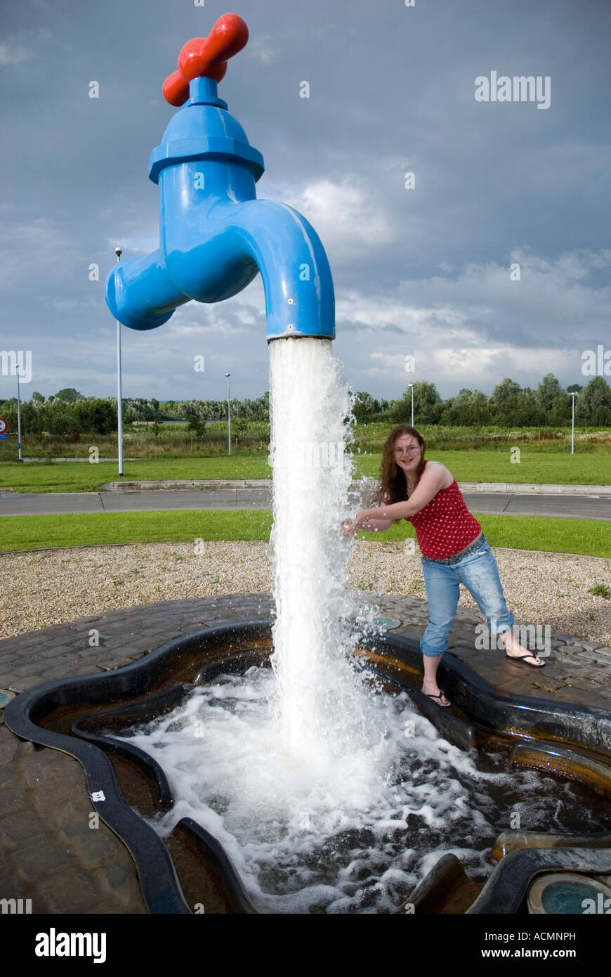 Unusual tap sculpture Stock Photo - Alamy