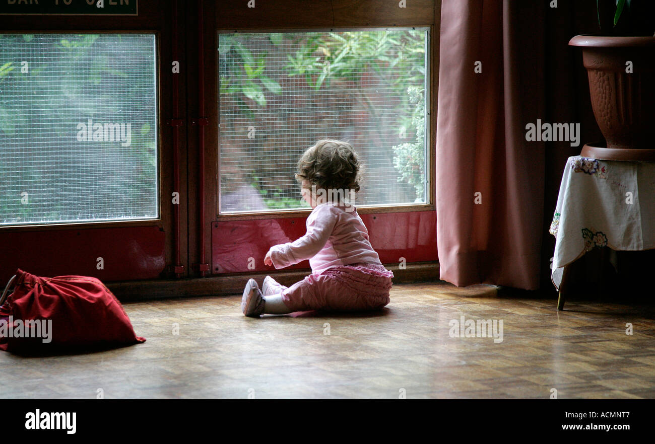 Child Sit Down On Floor
