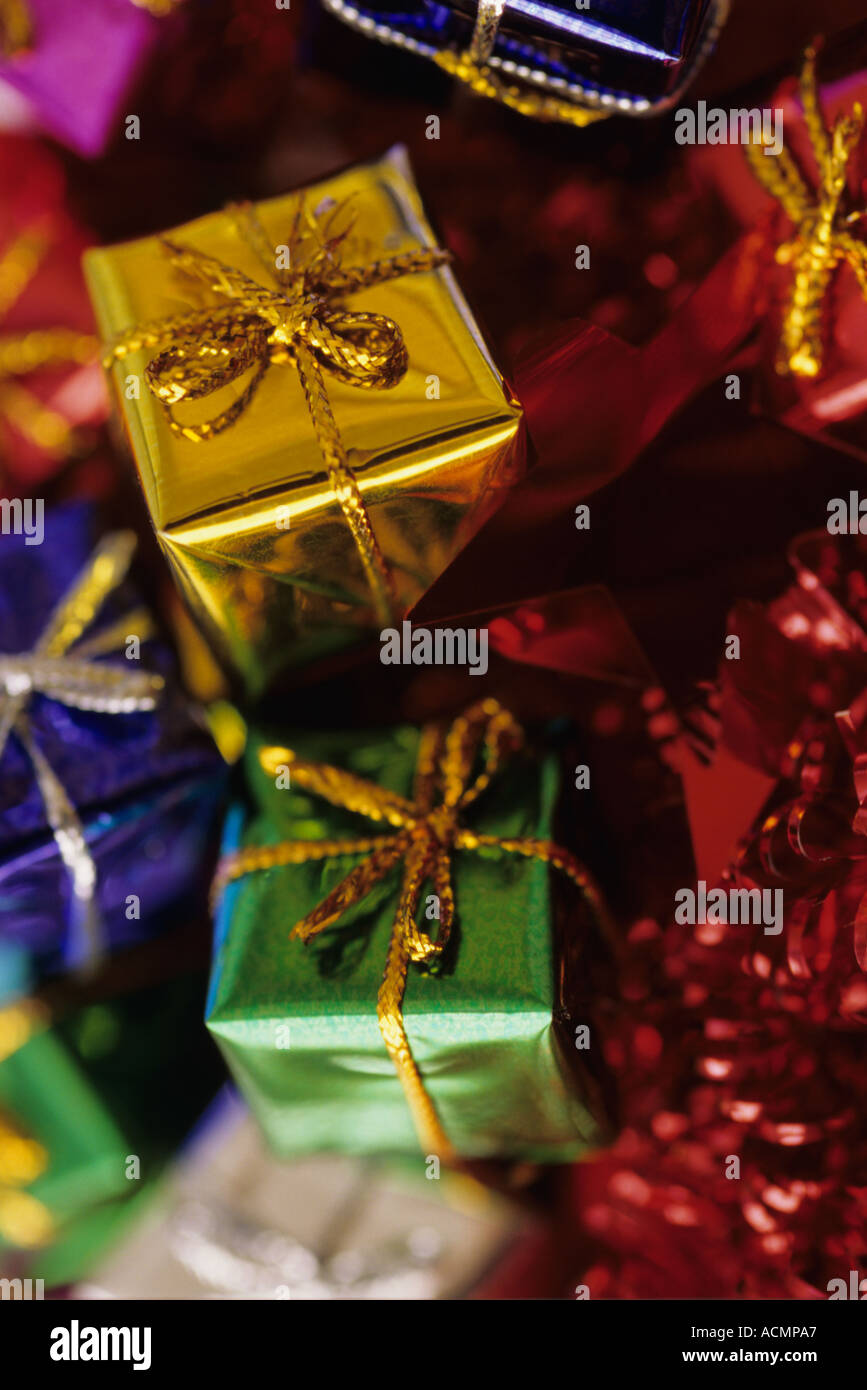 Christmas gift boxes small piled on each other multi colored with ...
