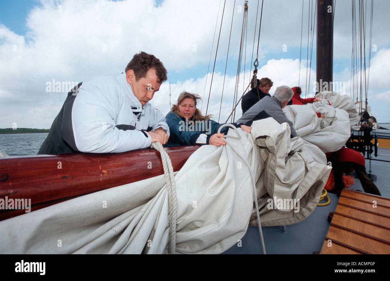 People on sailing ship Stock Photo - Alamy