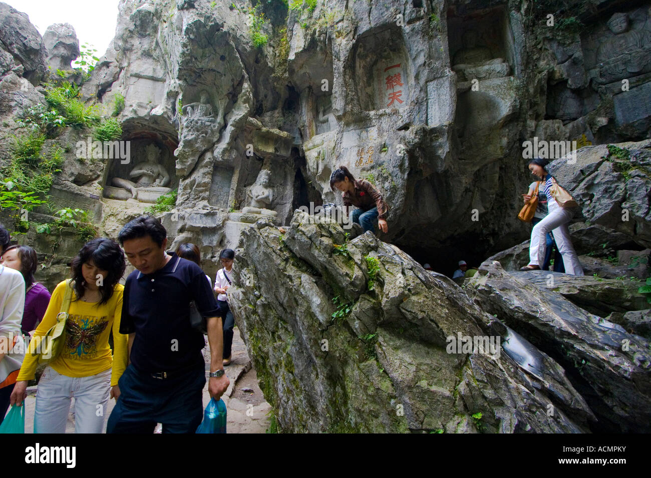 Domestic Chinese Tourists Enjoy Buddhist Rock Carvings Feilai Peak ...