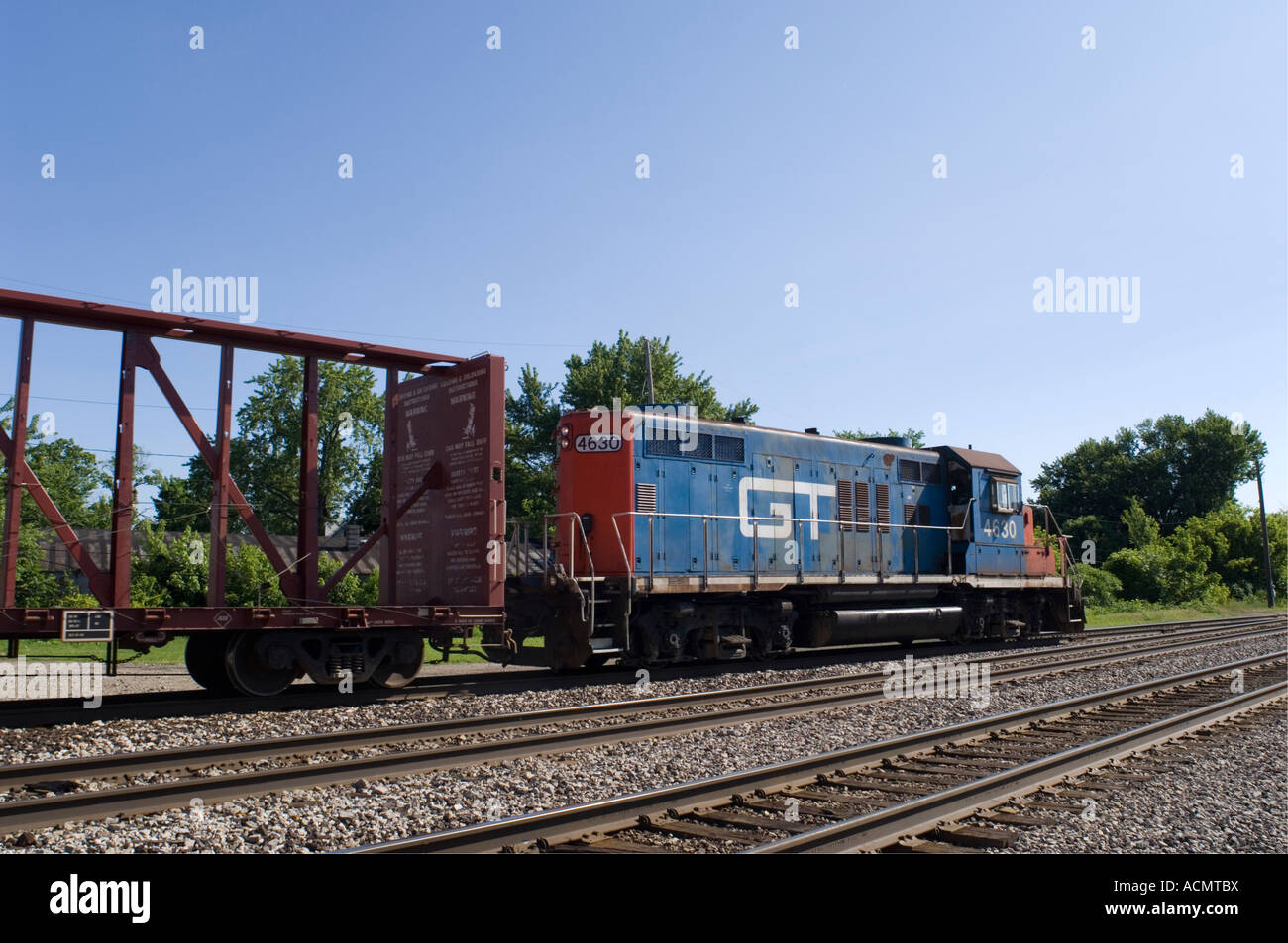 Locomotive and train car Stock Photo - Alamy