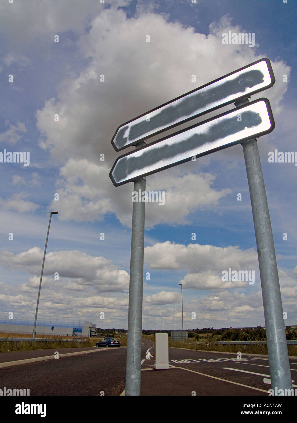 Blank sign post at the side of a new road construction Stock Photo - Alamy