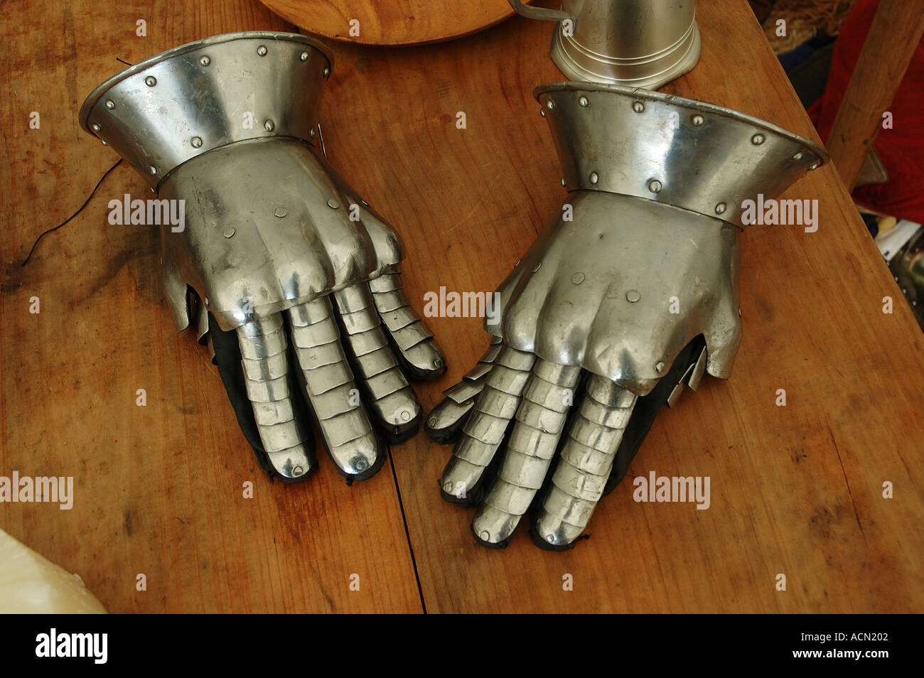 Gauntlet gloves thrown on table 2 two hands shiny polished dsc 1133 ...