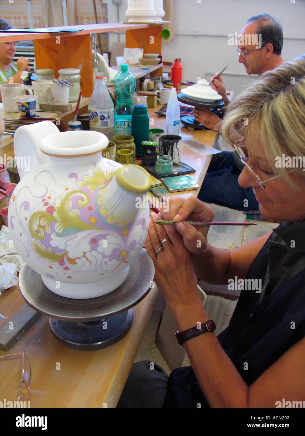 Hand painting of ceramics designs in ceramics factory in Deruta Italy ...