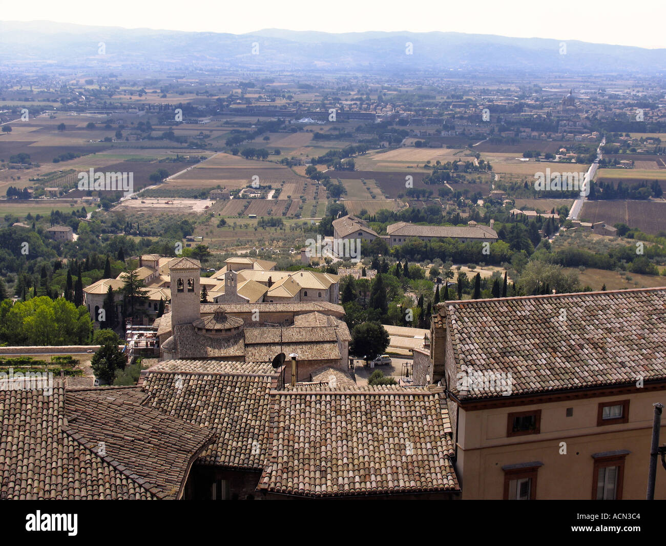 Umbria Assisi Italy view from city wall over valley with San Maria ...