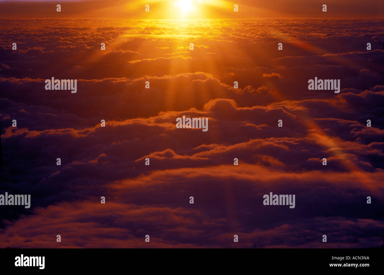 clouds from a plane window at dawn, sunset, photo by Bruce Miller Stock ...