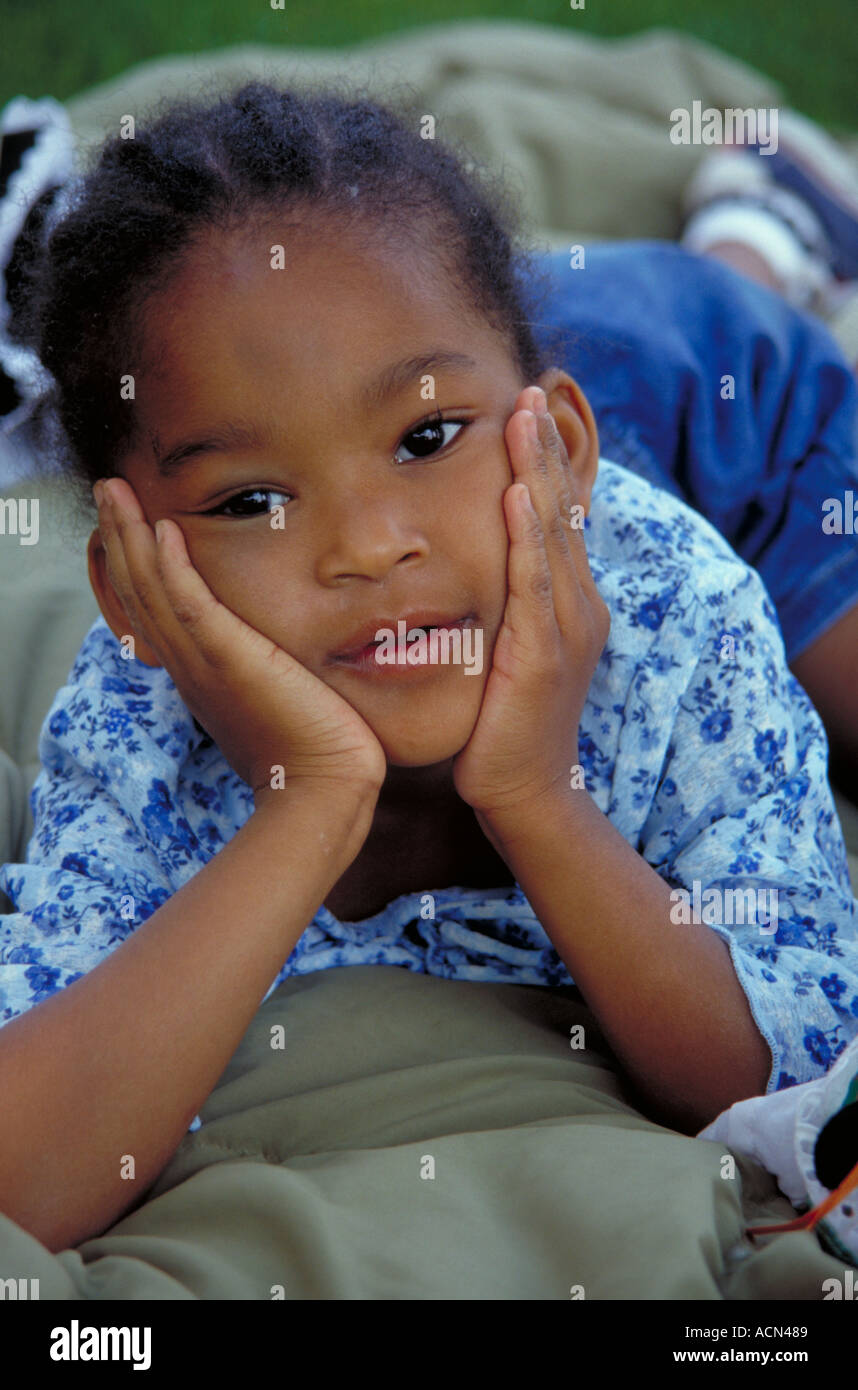 Outdoor Portrait of Black Child with Braids Stock Photo - Alamy