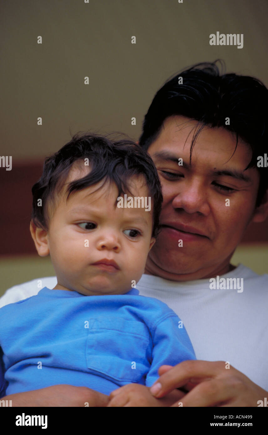 Hispanic father caring child hi-res stock photography and images - Alamy