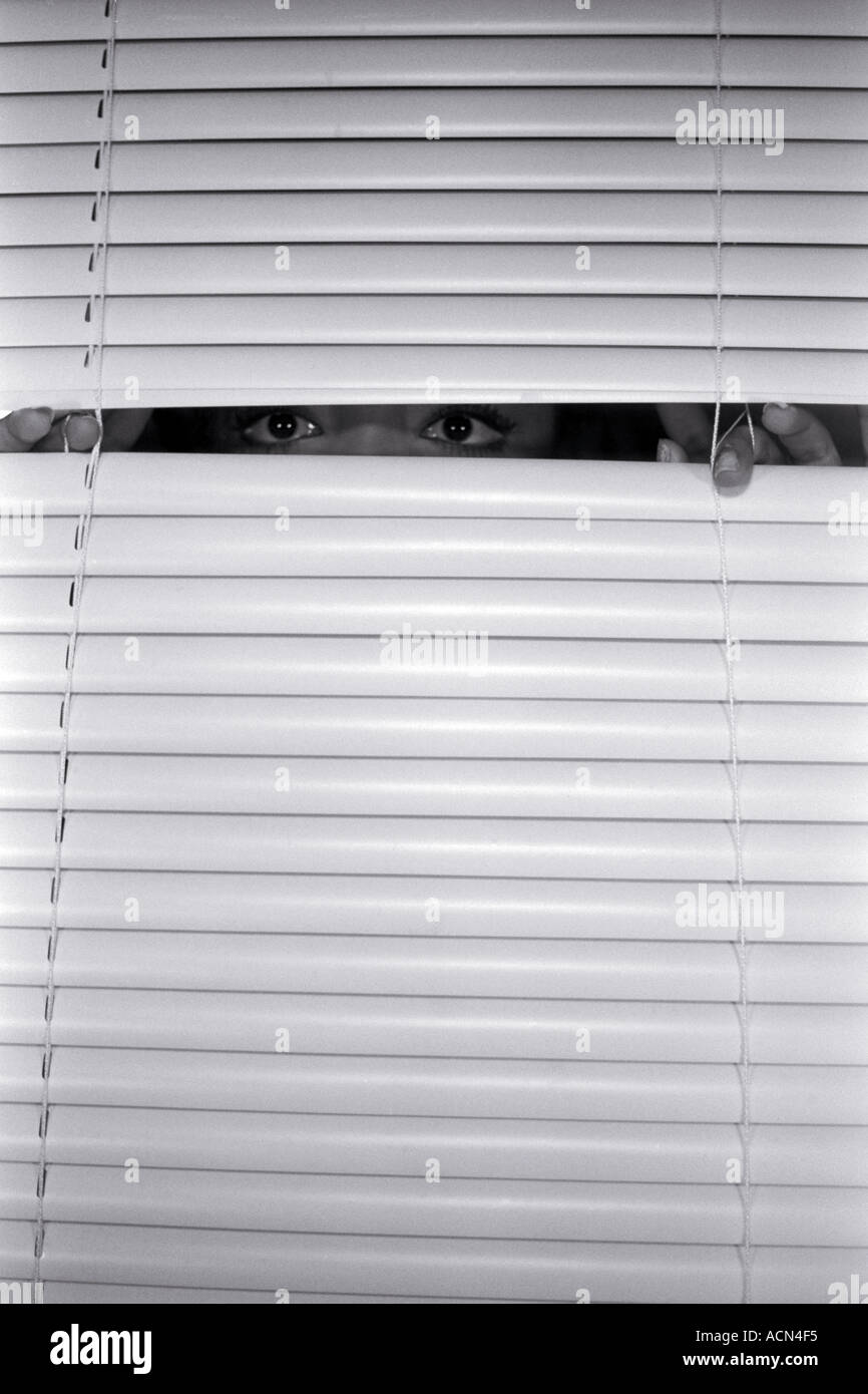 Hide behind blinds hi-res stock photography and images - Alamy