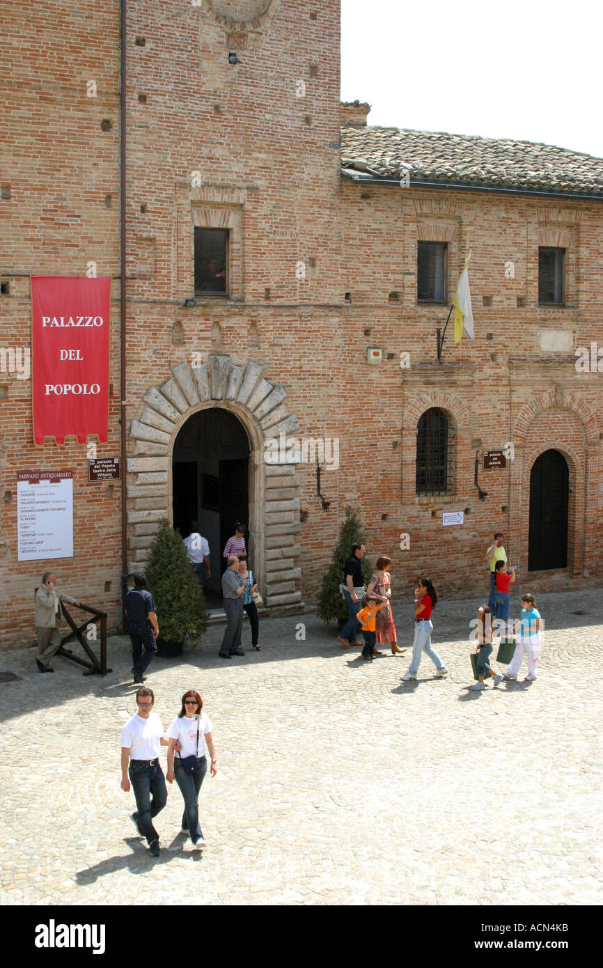 visitors strolling the ancient Piazza del Popolo of Sarnano in Le ...