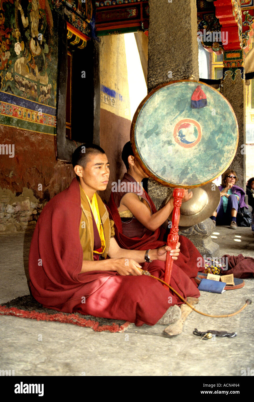 Tibetan monks playing drum and cymbals for religious dancing Stock ...