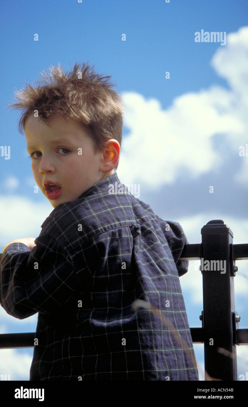 Little Boy Outdoors Questioning Stock Photo - Alamy