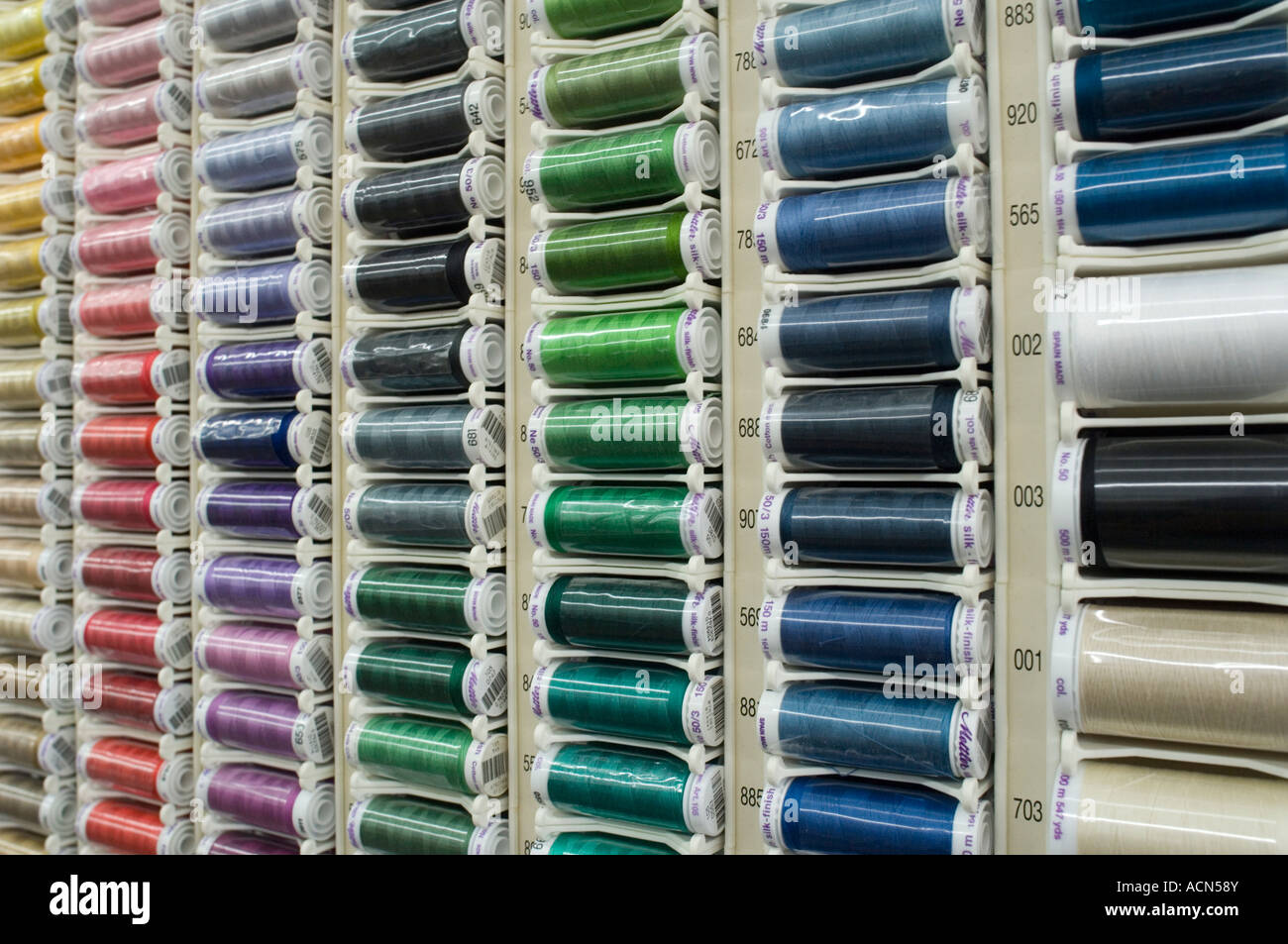 Spools of thread on display at a sewing shop Stock Photo - Alamy