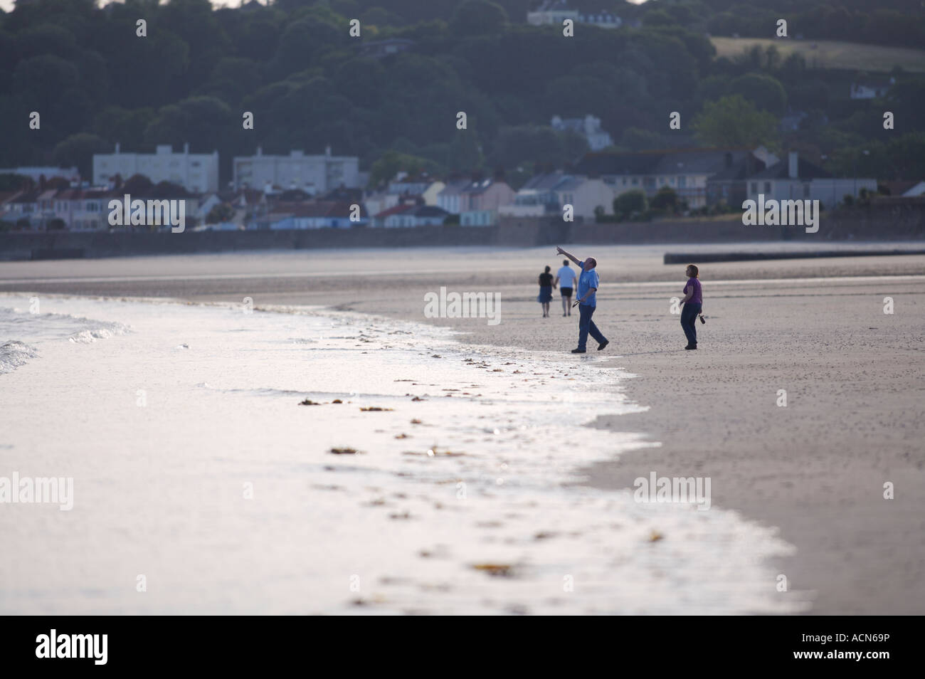 Jersey st helier beach walking hi-res stock photography and images - Alamy