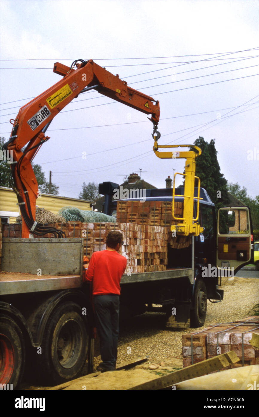 Unloading bricks hi-res stock photography and images - Alamy