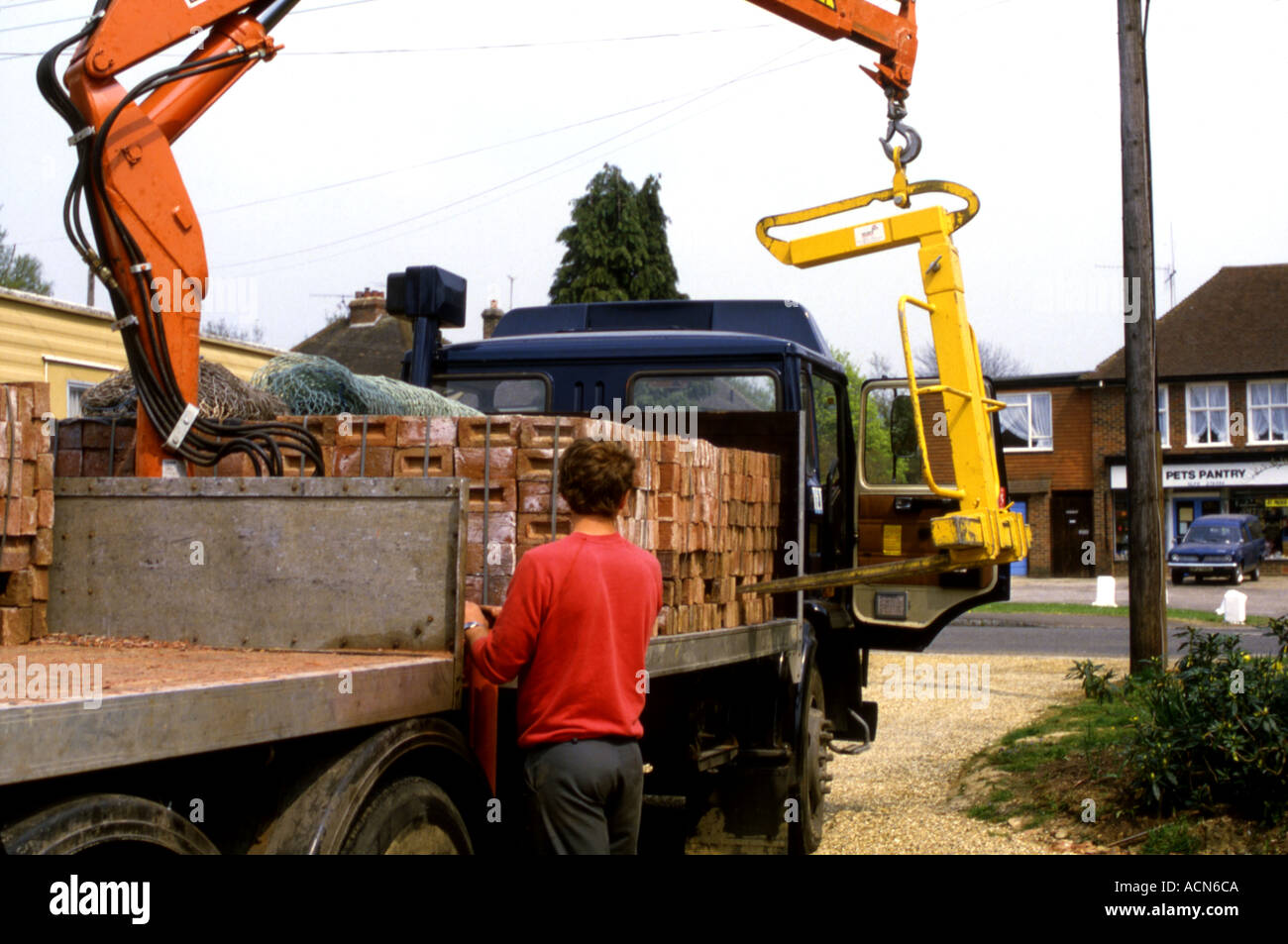 Unloading bricks hi-res stock photography and images - Alamy