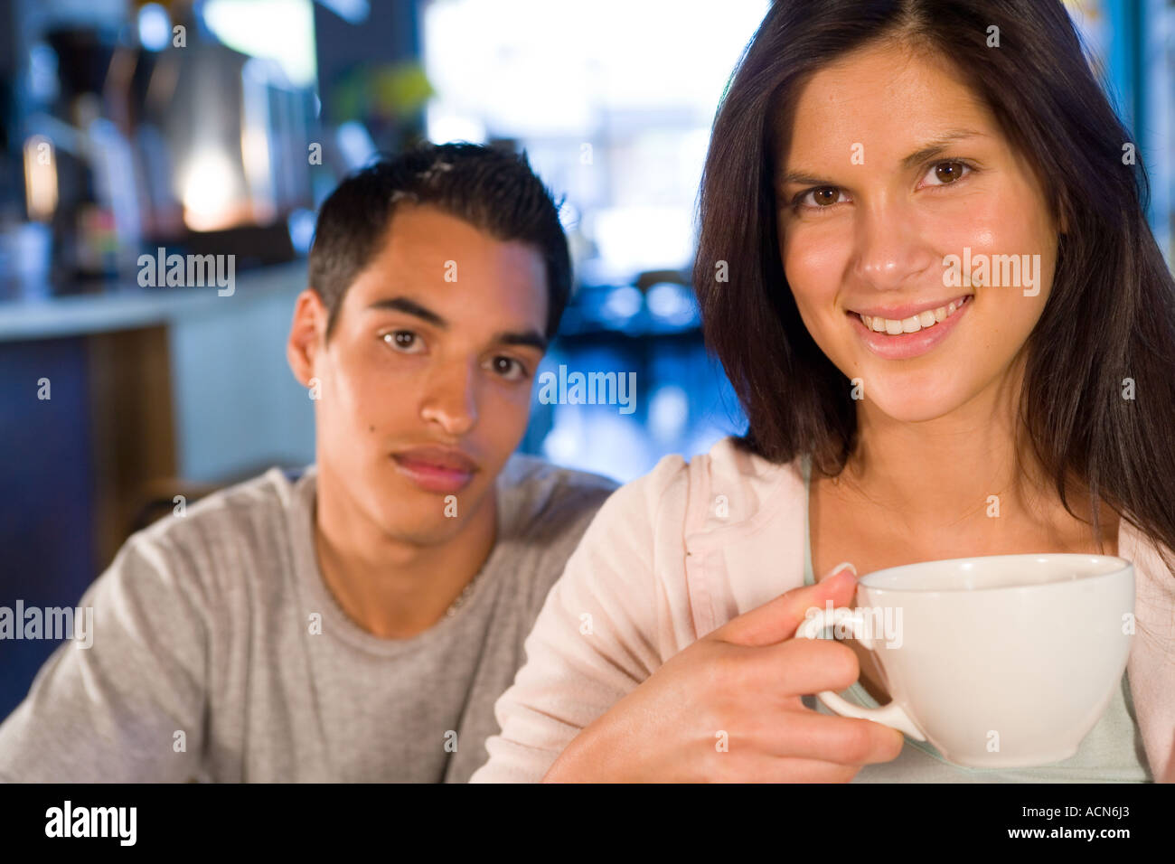 Teens drinking coffee cafe hi-res stock photography and images - Alamy