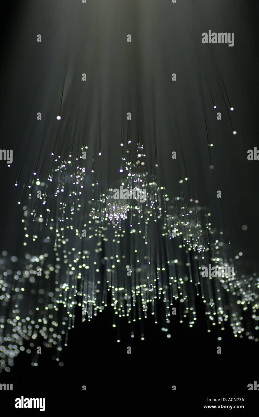 Stream of light flows from fiber optic cable dsc 6019 Stock Photo - Alamy