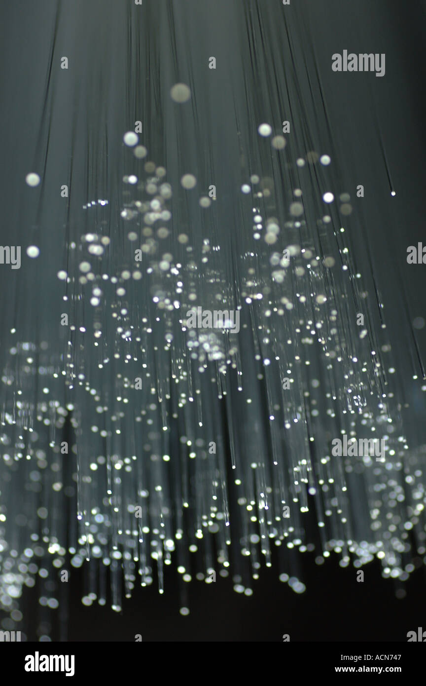 Stream of light flows falls from fiber optic cable dsc 6030 Stock Photo ...