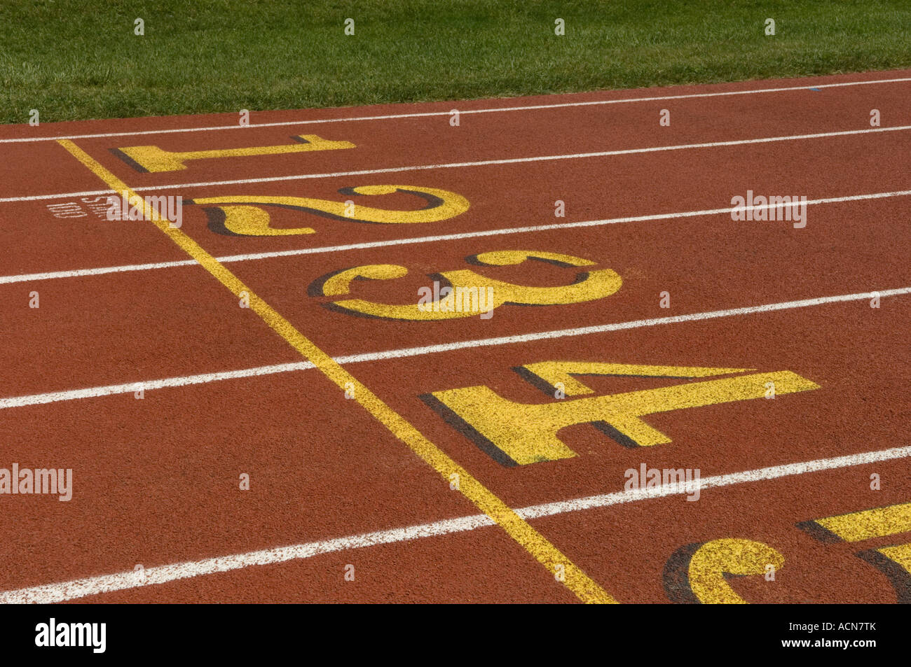 Track starting line with numerals and lane markings Stock Photo - Alamy