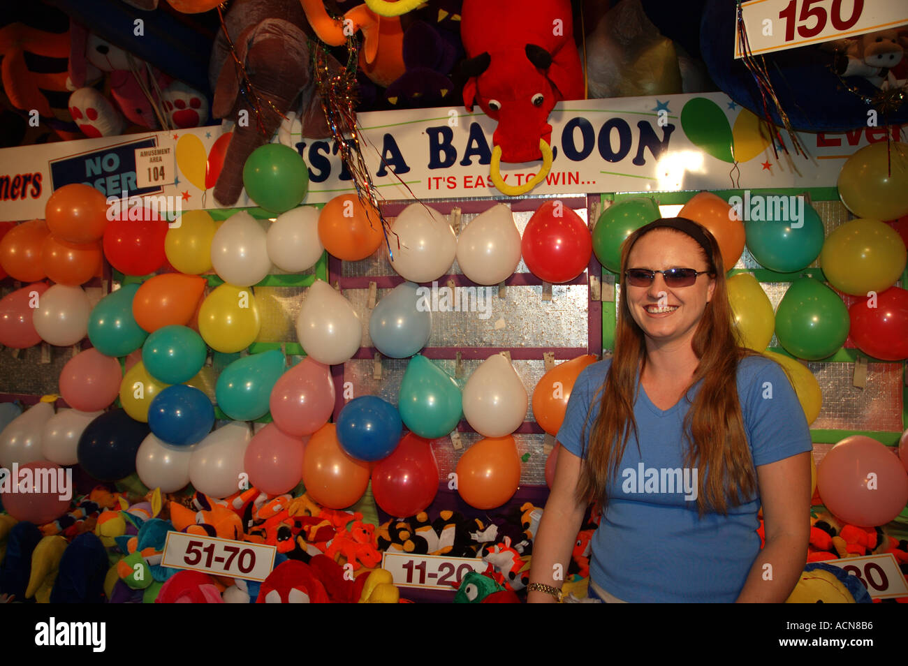 dart baloon game in sideshow alley dsc 1941 Stock Photo - Alamy