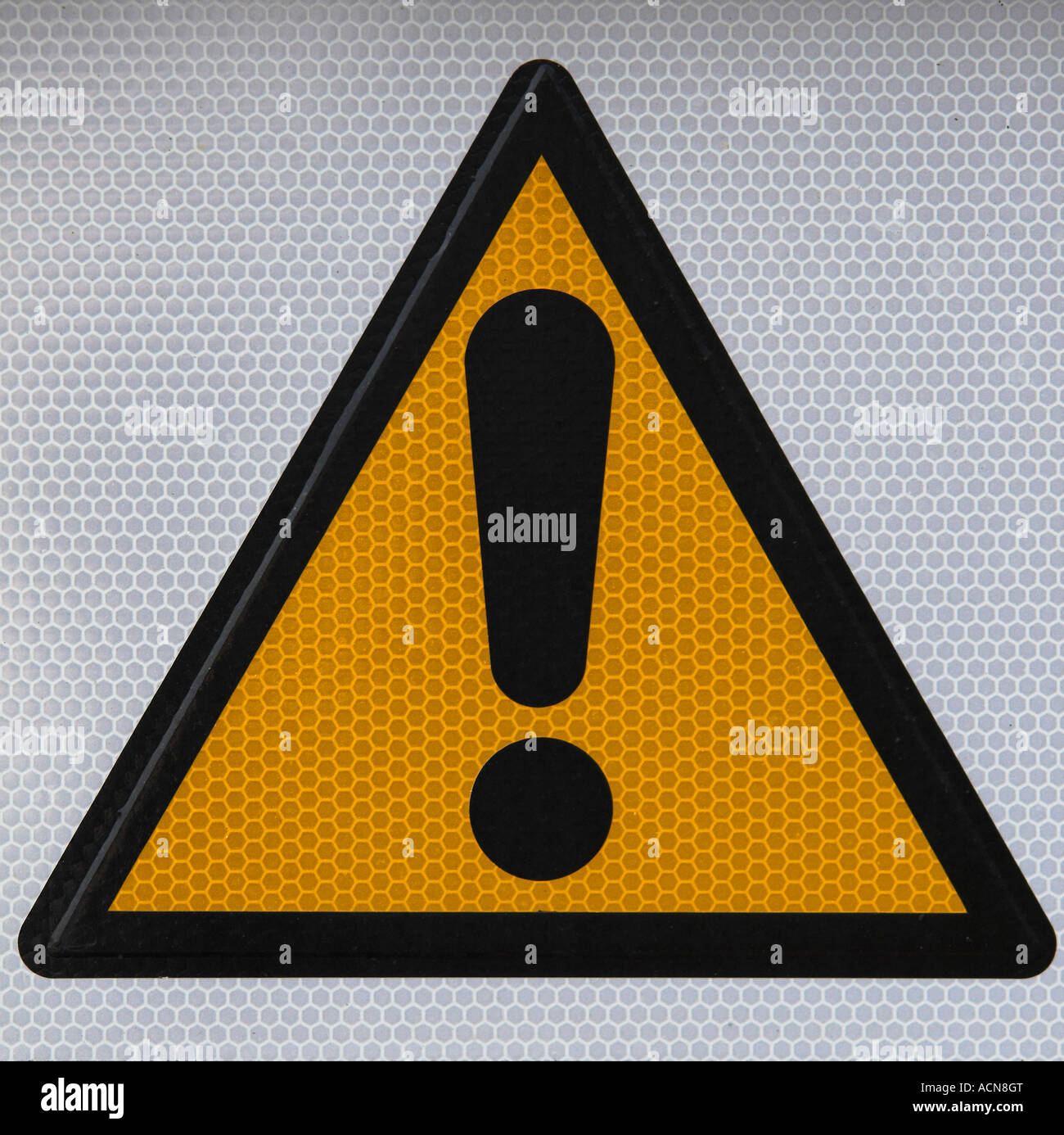 close up view of a warning sign (yellow triangle with exclamation mark ...
