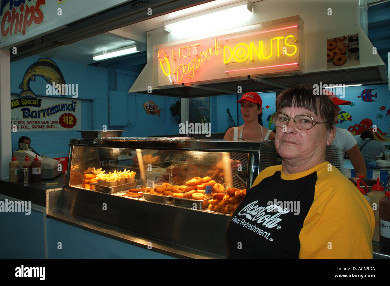 Donut and fast food stall and owner dsc 2153 Stock Photo - Alamy