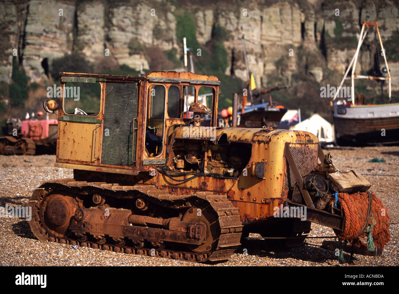 This old rusty bulldozer is now used to tow the large fishing trawlers ...