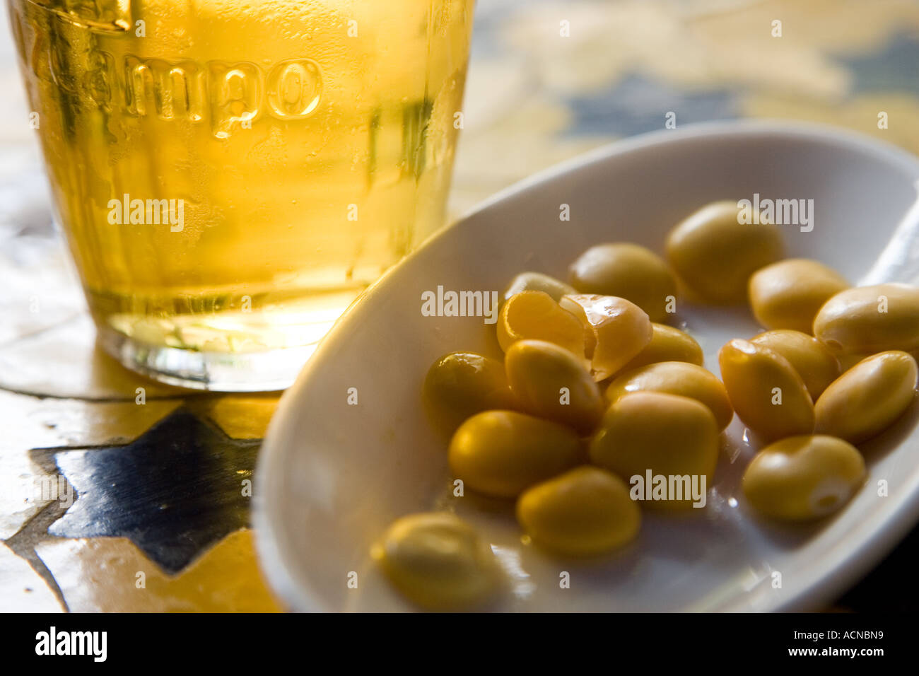 Beer and lupins, typical Sevillian snack Stock Photo - Alamy