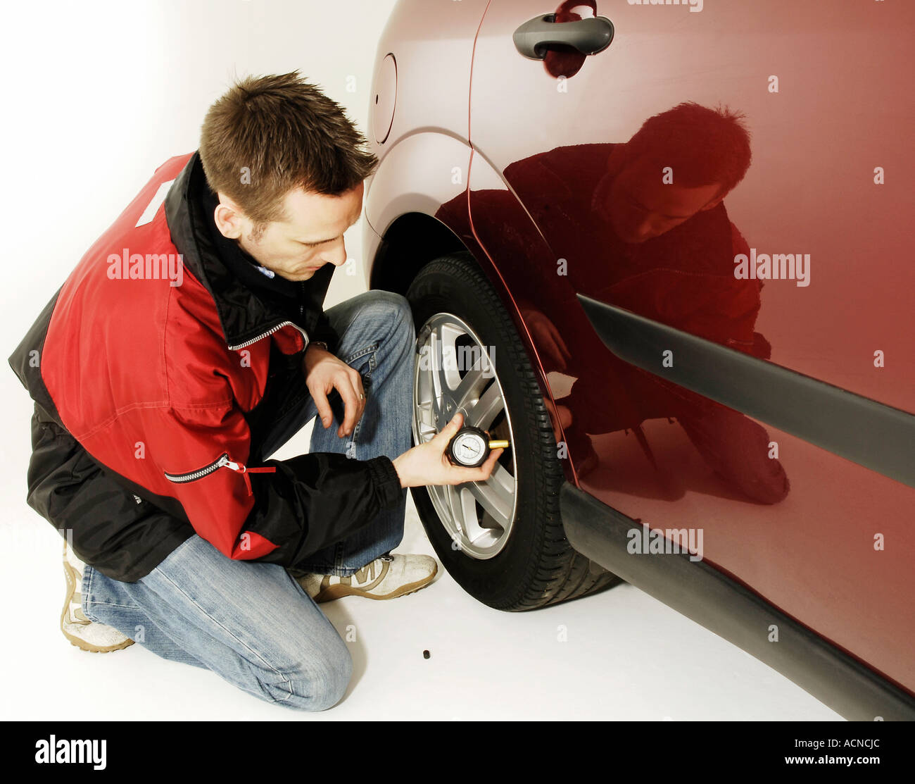 Tyre pressure hi-res stock photography and images - Alamy