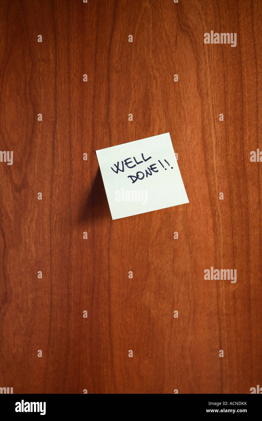 well done ! written on post it note memo Stock Photo - Alamy
