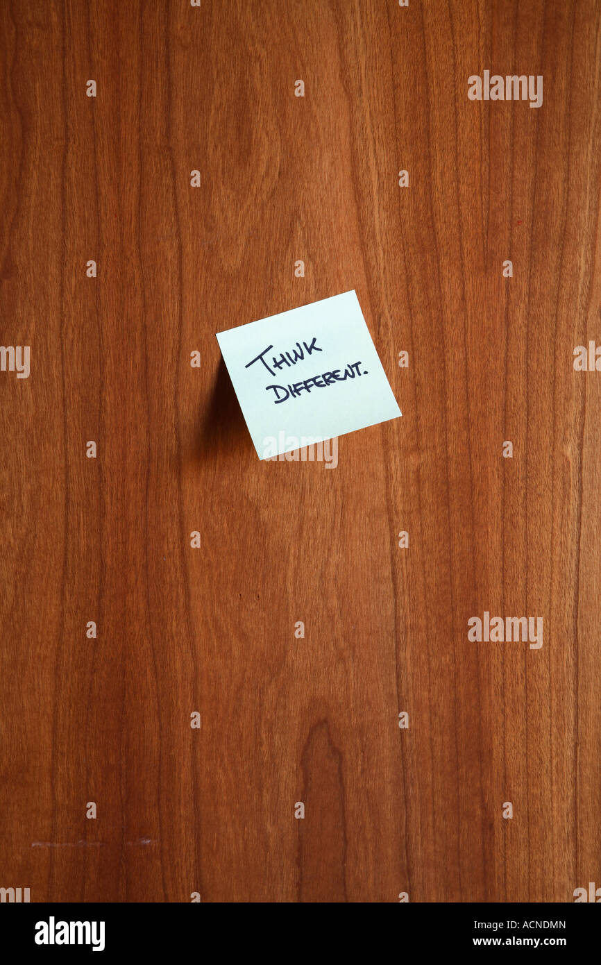 think different written on post it note memo Stock Photo - Alamy