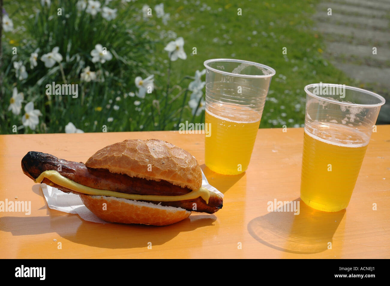 Grill sausage with bun and beer Stock Photo - Alamy