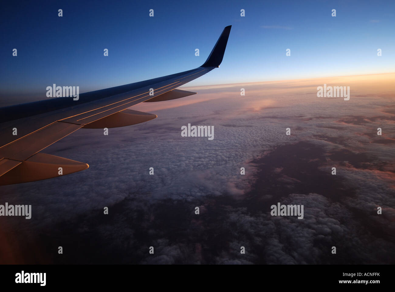 fly around world wings view Stock Photo - Alamy
