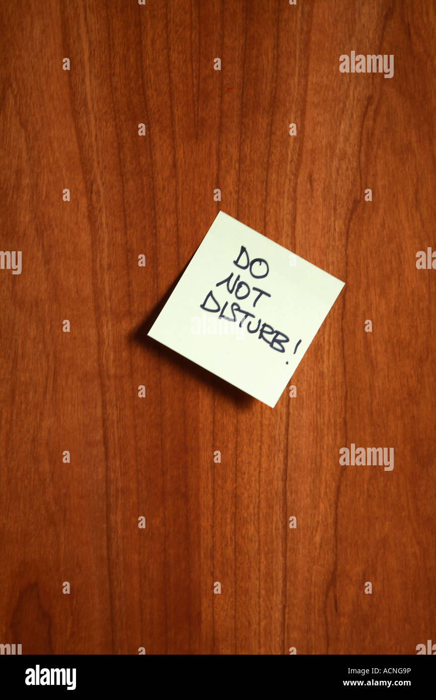do not disturb written on post it note memo Stock Photo - Alamy