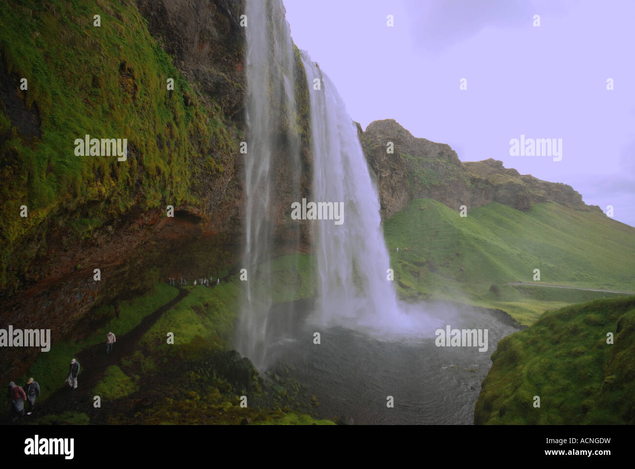 spetacular waterfall iceland people visit Stock Photo - Alamy