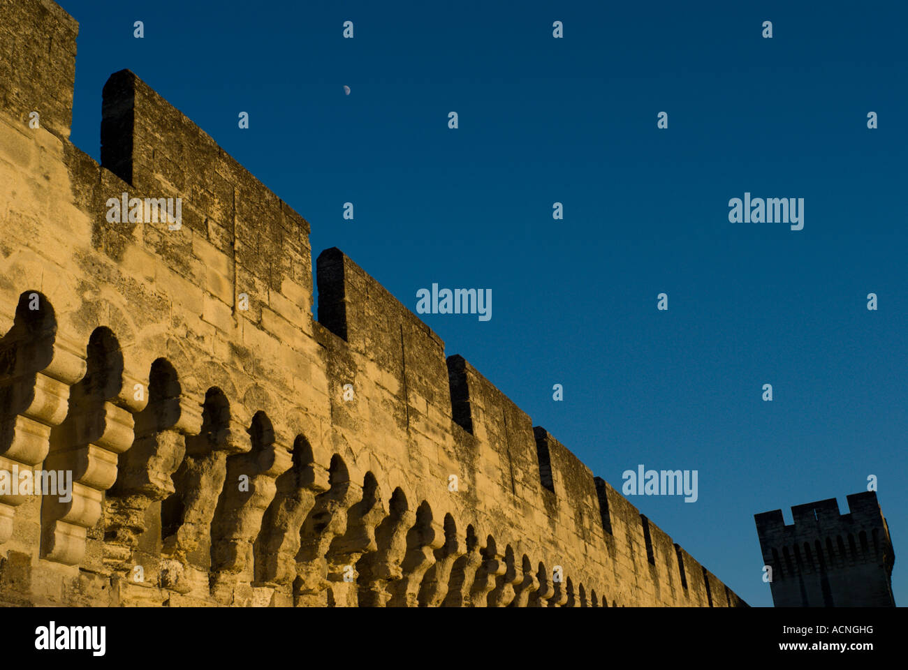 Avignon France the mediaeval city walls with rising moon Stock Photo ...