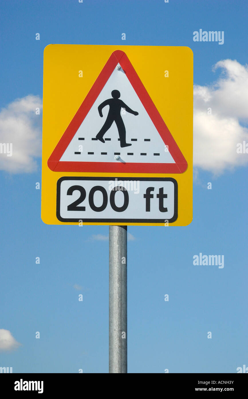 Pedestrian crossing ahead 200 ft road sign Stock Photo - Alamy
