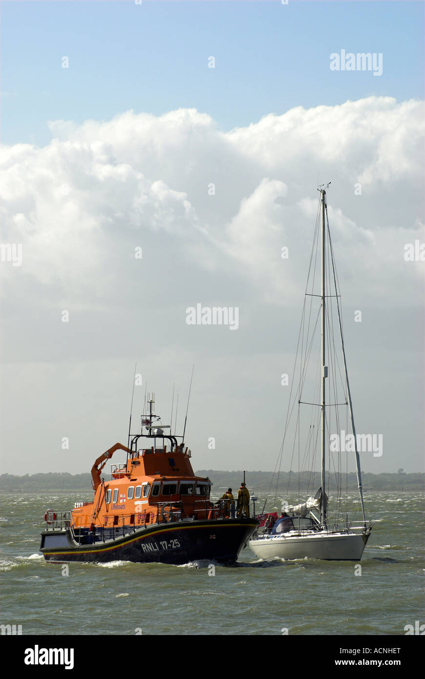 The Yarmouth based RNLI lifeboat helps a stricken yacht in the Solent ...