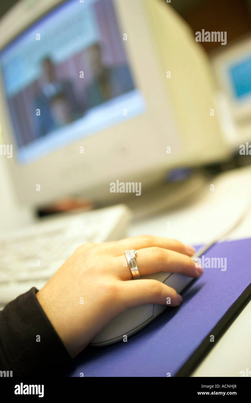 Hand with computer mouse Stock Photo - Alamy