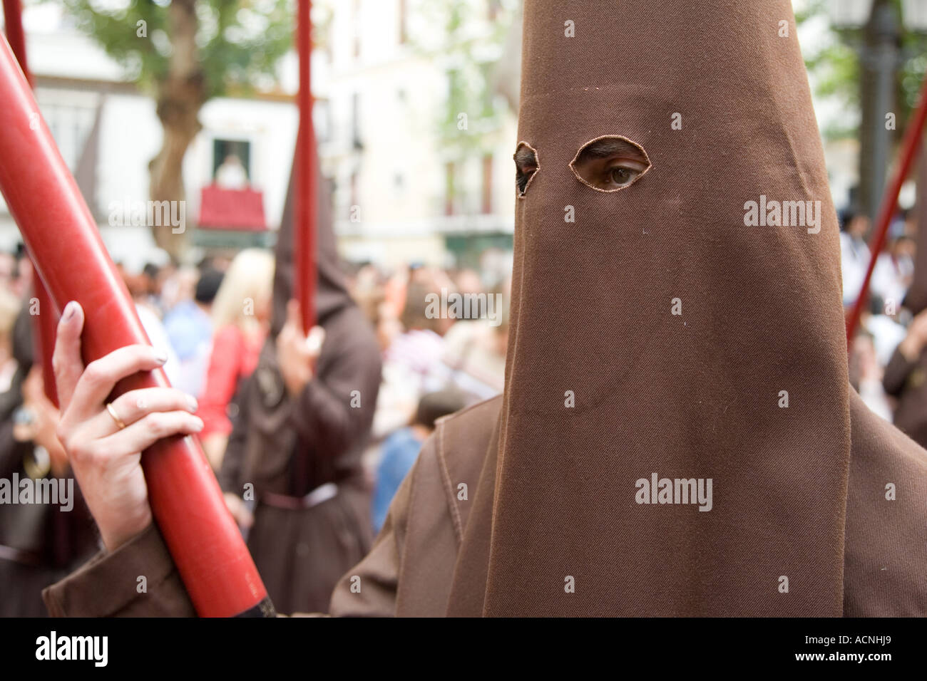 Penitents with brown hood, holy week, seville, spain, 2006 Stock Photo ...